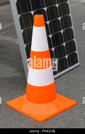 Solar panel installation and safety cone Stock Photo - Alamy