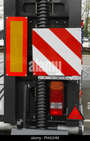 Trailer lights and retroreflective warning traffic signs Stock Photo ...
