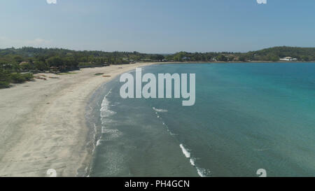 Beautiful tropical beach Cabugao with white sand and palm trees in the ...