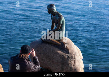 The Little Mermaid is a bronze statue by Edvard Eriksen in Copenhagen, Denmark Stock Photo - Alamy