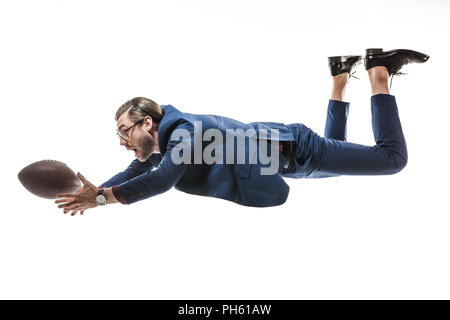 Catching ball and falling. Man, professional american football player ...