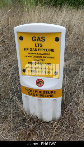 A gas pipeline marker post in the Norfolk countryside at Ringland ...