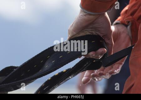 Oil pollution containment boom deployment exercise at Weymouth Harbour ...