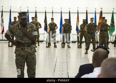 Lt. Col. Matthew T. Daigneault, left, commanding officer, Headquarters ...