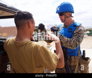 U.S. Marine Lance Cpl. Tanner Kaltenberg, a motor vehicle operator with ...