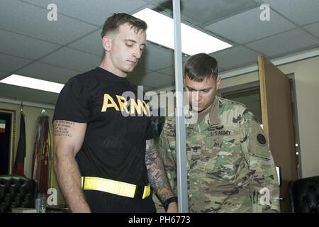 U.S. Army Spc. Cameron Gaylor, a military policeman assigned to the ...