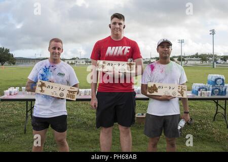 US Navy Electronics Technician Third Class performs maintenance on the ...
