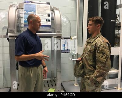PANAMA CITY, Florida - Navy Diver Steven Askew is promoted to the rank ...