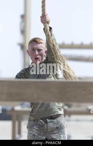 U.S. Army Sgt. Adam Everett, a military policeman assigned to the 202nd ...