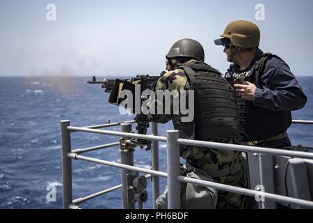 While wearing a Joint Service Lightweight Integrated Suit Technology ...