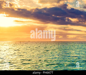 Amazing sunrise over ocean tropical beach. Dramatic colorful cloudy sky ...