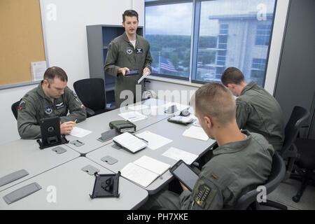 U.S. Army Reserve Capt. John Milicevich, a civil affairs officer, and ...