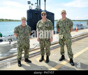 CMDR Ryan, commanding officer of the nuclear-powered attack submarine ...