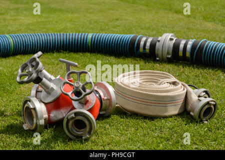 fire brigade, hose, rolled, unrolled, fire brigade, hose, rolled ...