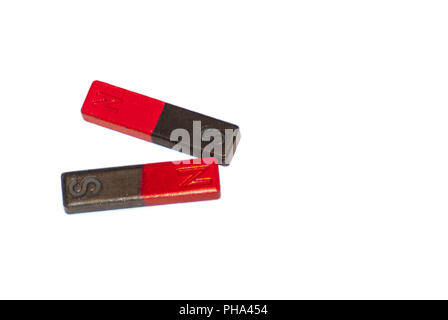 two magnets isolated on white Stock Photo - Alamy