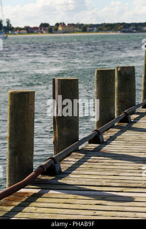 sunny boat jetty on Årø island, Denmark Stock Photo - Alamy