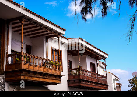 Wooden classic balcony, colonial style old historic house. Retro ...