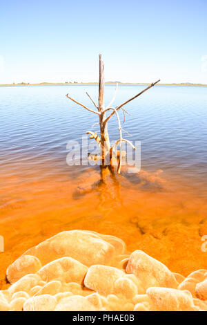 red polluted lake Stock Photo - Alamy