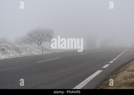 Poor visibility driving conditions in heavy rain; drivers point of view ...