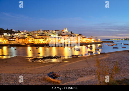Portugal, Algarve: Traditional white washed house with blue windows and ...