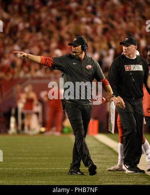 Western Kentucky Hilltoppers head coach Tyson Helton watches a replay ...