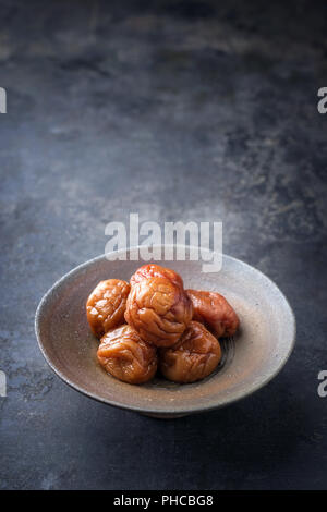 Umeboshi is a traditional Japanese dish, an ume pickle that is dried ...