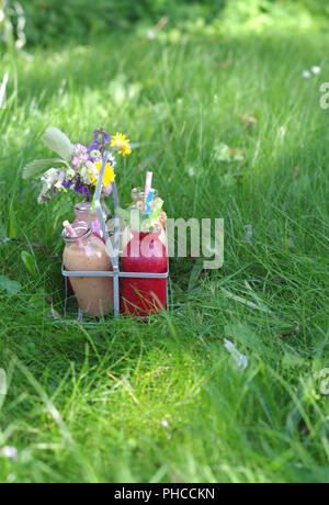 various fruit smoothies in flask Stock Photo - Alamy