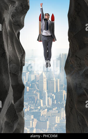 Businessman overcoming challenges in business concept Stock Photo - Alamy