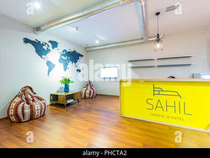 Hotel reception of hostel dormitory Stock Photo - Alamy