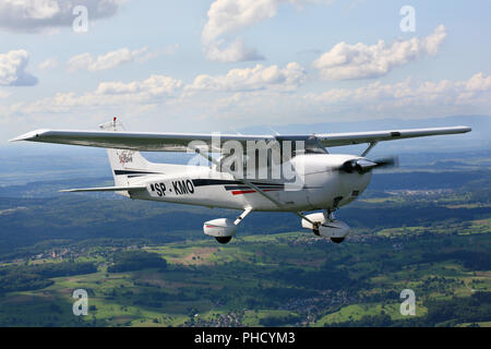 aerial view above Cessna 172 waiting to take off at threshold of off ...