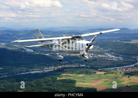 aerial view above Cessna 172 waiting to take off at threshold of off ...