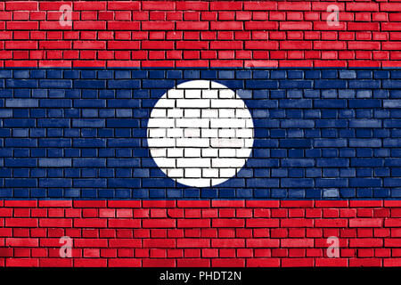 Laos national flag painted on textured wall mural background Stock ...