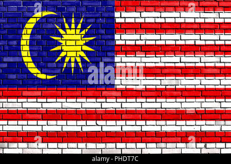 Malaysia national flag painted on textured wall mural background Stock ...
