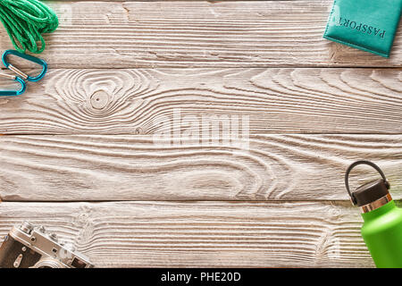 Travel items for hiking over wooden background Stock Photo - Alamy