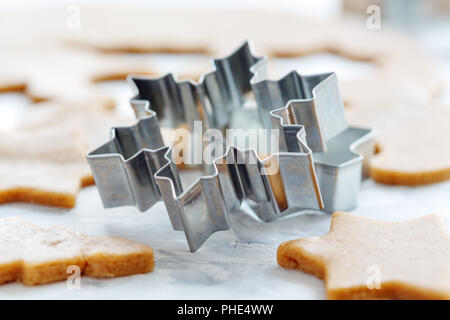 Christmas cookies background with cutters and flour. Holiday concept ...