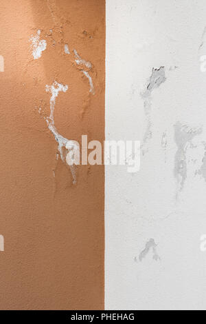 Paint peeling off plaster wall in a derelict building Stock Photo ...