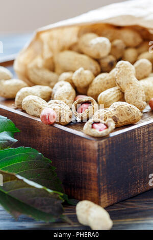 Peanuts in paper bag Stock Photo - Alamy