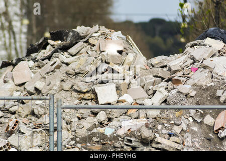 Construction site debris pile of waste, used bricks, concrete slabs ...