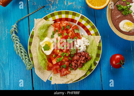 East African cuisine - Timatim Tomato Salad, Traditional assorted ...