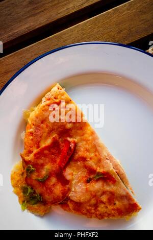 Cold leftover pepperoni pizza Stock Photo - Alamy