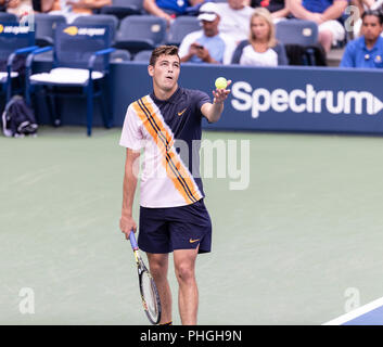 Taylor Fritz of the U.S. serves against Germany's Daniel Altmaier ...