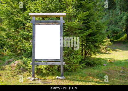 Sign board outside public park. General warnings to follow. Rules to ...