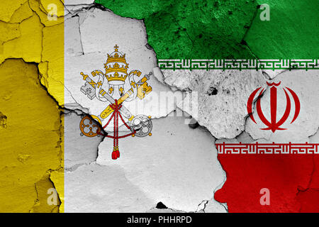 The national flag of Iran painted on a weathered broken wall ...