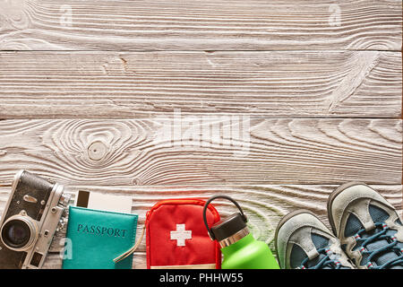 Travel items for hiking over wooden background Stock Photo - Alamy
