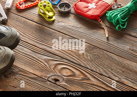 Travel items for hiking over wooden background Stock Photo - Alamy