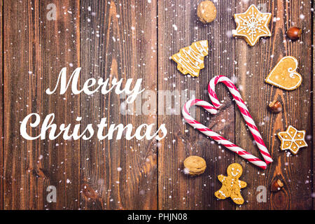 Merry Christmas. Christmas candy canes, gingerbreads of different ...