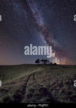 Stunning vibrant Milky Way composite image over landscape of ancient ...