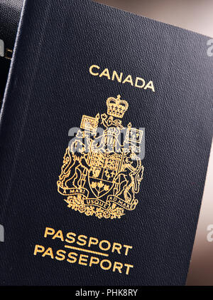 Composition with two Canadian passports Stock Photo - Alamy