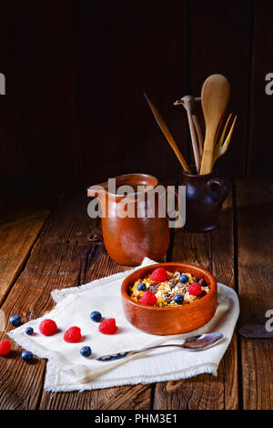 rustic muesli breakfast with forest fruits Stock Photo - Alamy