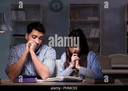 The two students studying late at night Stock Photo - Alamy